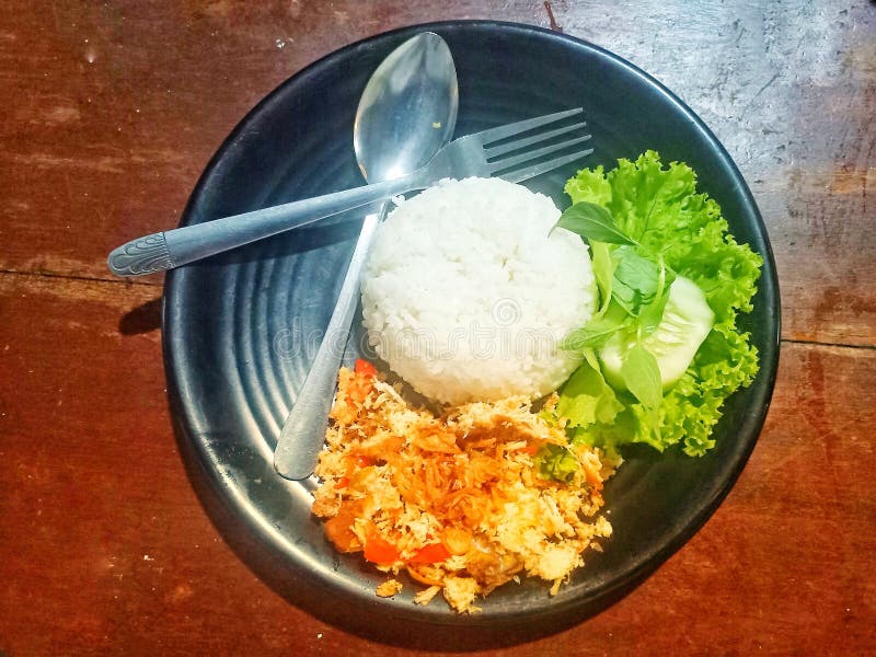Dinner Dish: Crispy Chicken Rice with Fresh Vegetables Stock Image ...