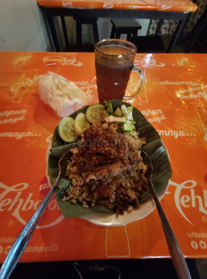 Dinner with Fried Rice and a Glass of Hot Tea at a Simple Food Stall ...