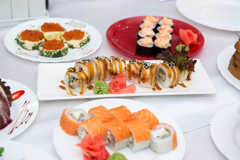 Dinner at a Japanese Restaurant. Snacks at the Sushi Bar Stock Photo ...