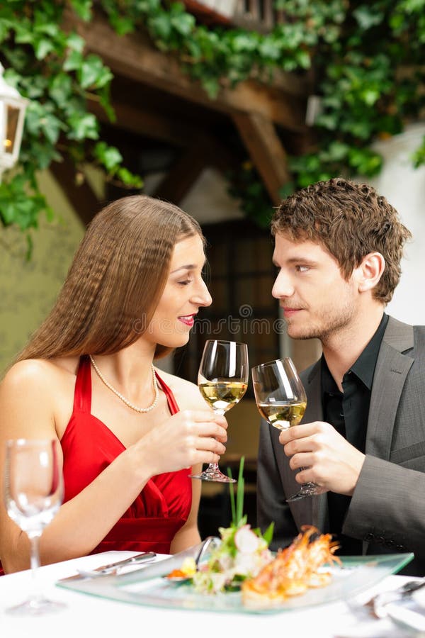 Dinner or Lunch in Restaurant Stock Image - Image of dress, dishes ...