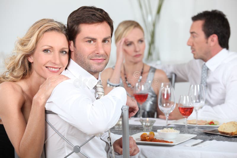 Dinner party discussions stock photo. Image of entertaining - 23862410