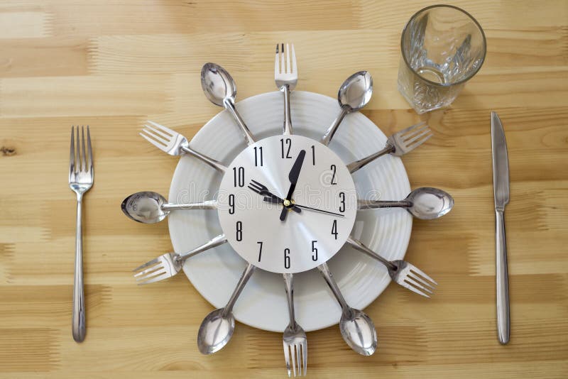 Dinner Plate Clock Table stock photo. Image of business - 72690126