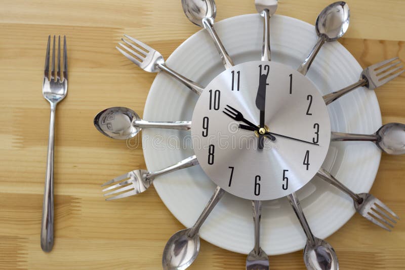 Dinner Plate Clock Table stock photo. Image of business - 72690126