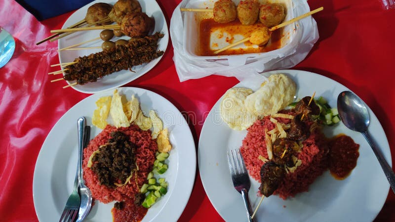 Dinner of Red Fried Rice with Spicy Satay Stock Photo - Image of ...