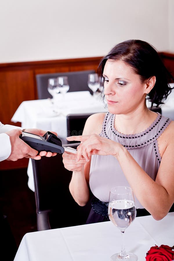 Dinner in Restaurant Man and Woman Pay by Credit Card Stock Photo ...