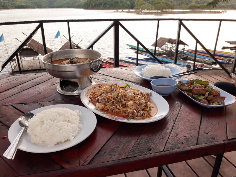 Dinner at Riverside during Sunset Stock Image - Image of evening, love ...