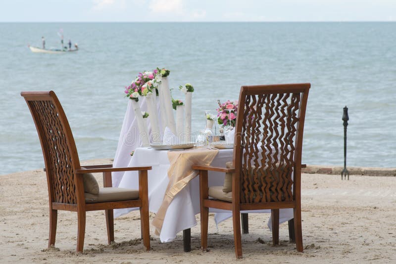 Dinner Setting on the Beach Stock Image - Image of beautiful, shore ...
