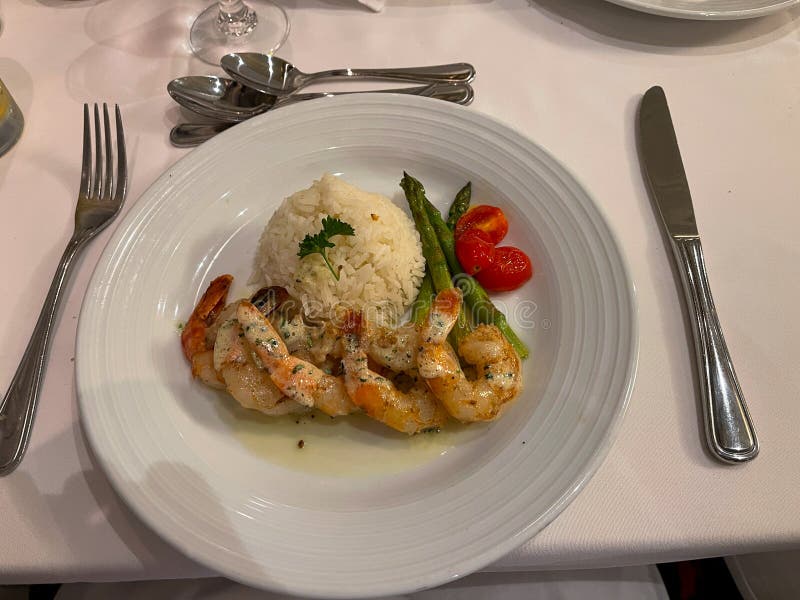 A Dinner of Shrimp, Rice and Asparagus at a Cruise Ship Restaurant ...