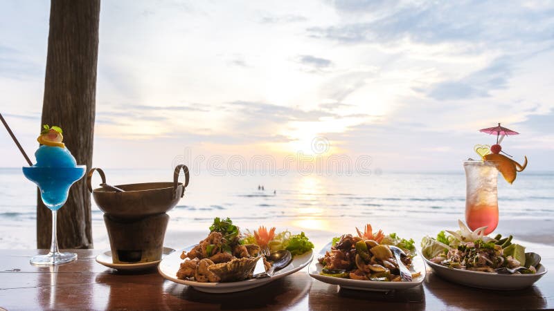 Dinner during Sunset with Fish and Thai Food Stock Photo - Image of ...