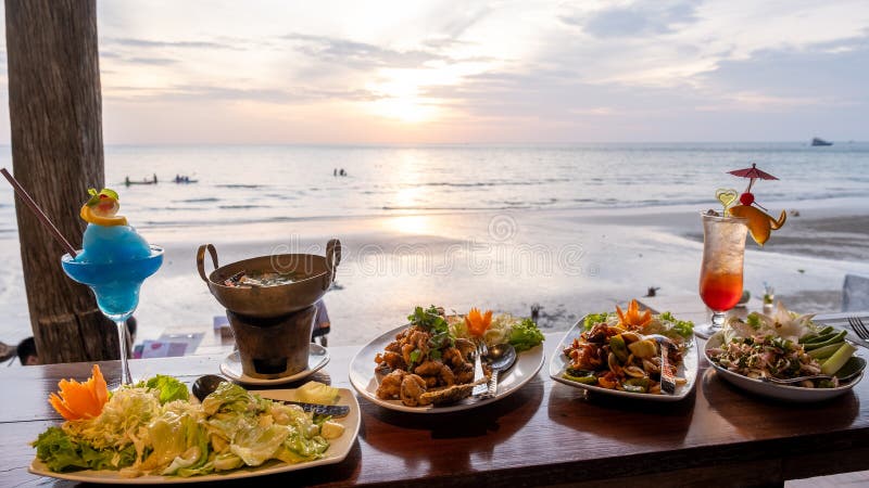 Dinner during Sunset with Fish and Thai Food Stock Image - Image of ...