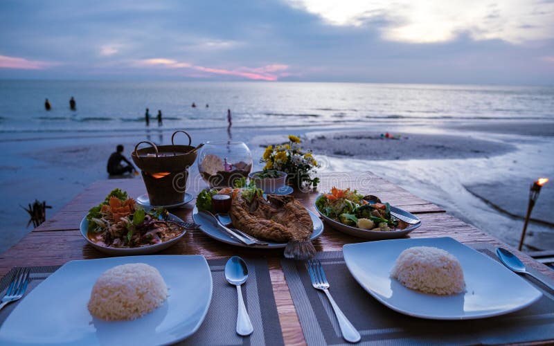 Dinner during Sunset with Fish and Thai Food Stock Image - Image of ...