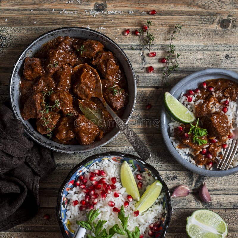 Dinner Table - Braised Beef Stew and Rice on a Wooden Rustic Table ...