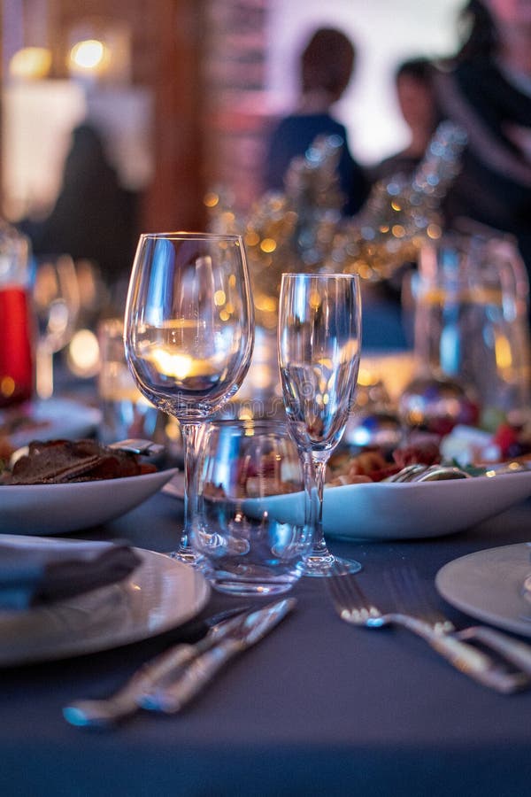 Dinner Table with Candles Ready for Christmas Celebration Stock Photo ...