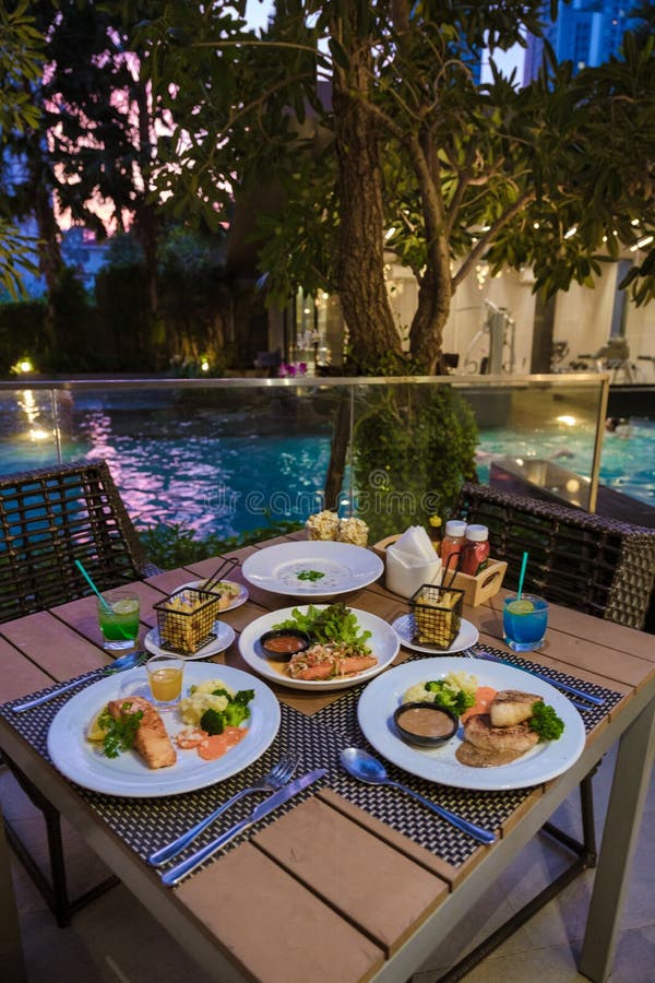 Dinner Table in the Evening in a Hotel in Thailand Stock Photo - Image ...