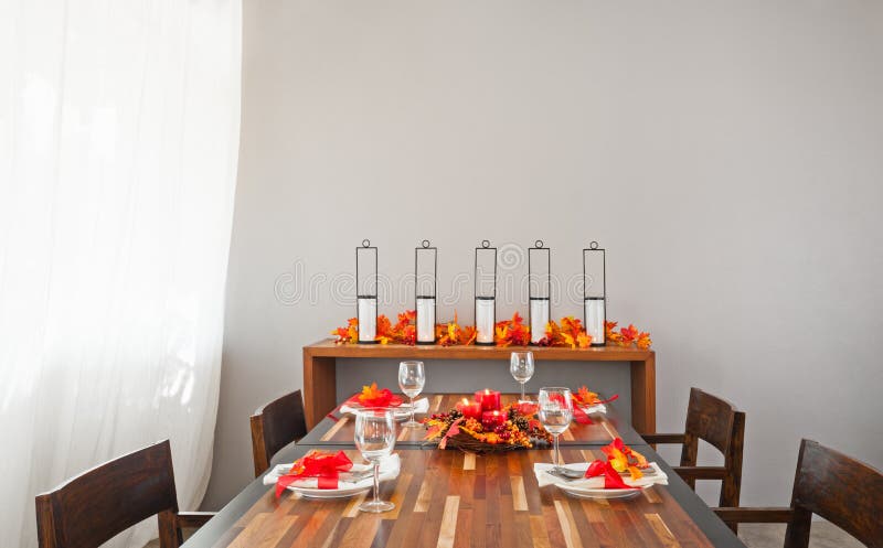 Dinner Table Setting in Warm Orange Red Colors Stock Photo - Image of ...