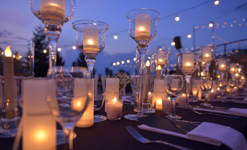 Dinner Table with Candles at a Wedding by Night Stock Photo - Image of ...