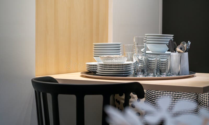 Dinnerware Set on Wooden Table in Elegant Modern Restaurant or House ...