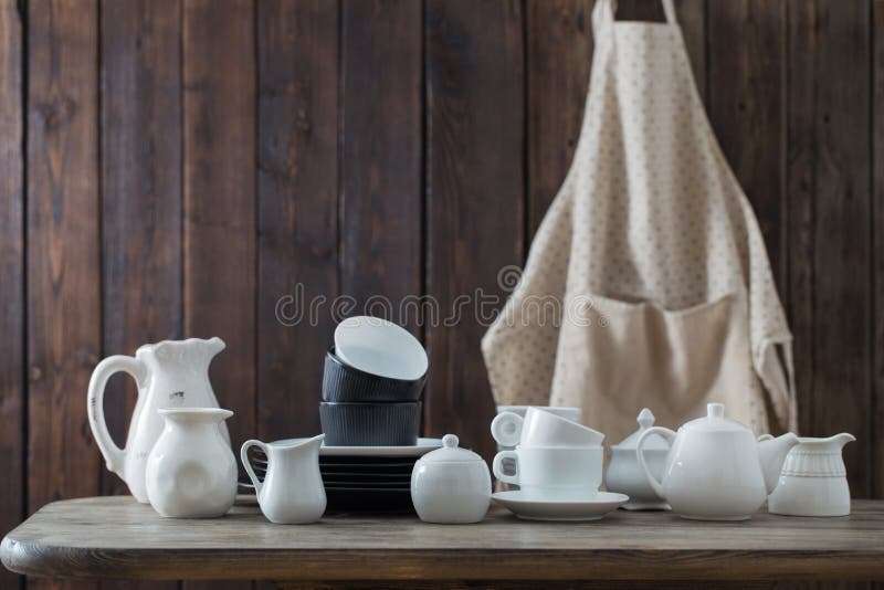 Dinnerware on Wooden Background in Kitchen Stock Image - Image of ...