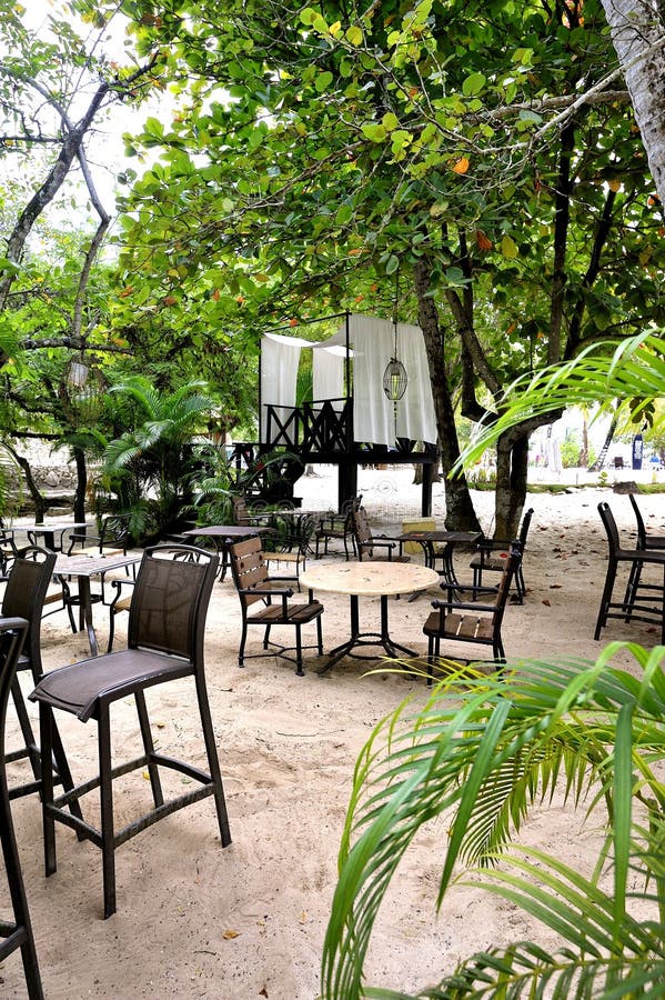 Dinning Area stock image. Image of beach, chairs, green - 57042119