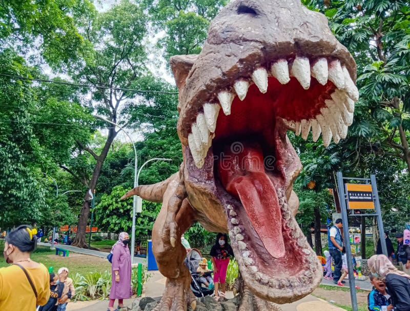 Dinosaur Statue at the Old Age Park in Bandung, Indonesia. Editorial ...