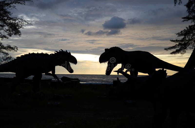 Dinosaur in Sunset Beach Dark Stock Photo - Image of factory, vintage ...