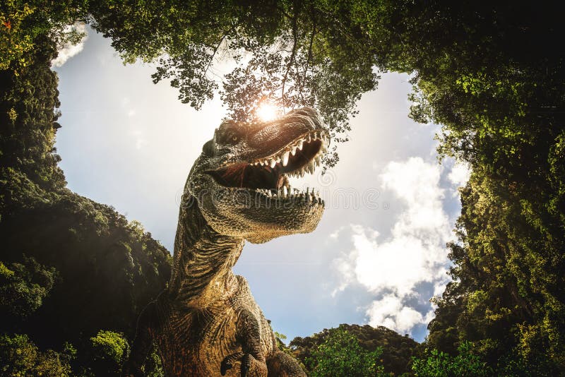 Dinosaur , T-rex With Tree Branches Against On The Nature Stock Image ... Dinosaur , T-rex With Tree Branches Against On The Nature Stock Image ...