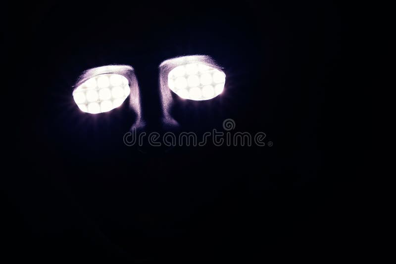 Glowing Robot Eyes in the Dark Stock Photo - Image of diodes, mystery ...
