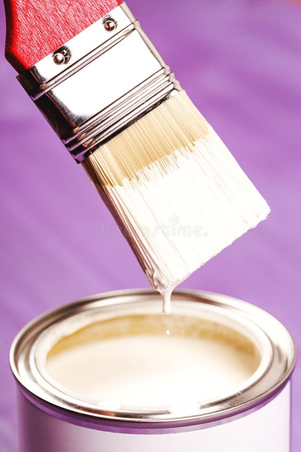 Dip brush into the paint. stock photo. Image of fluide - 69118012