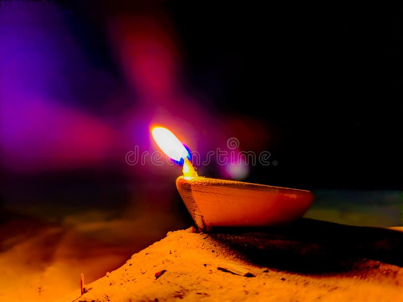 Dipawali Diya with Glittering Light Stock Image - Image of diya, colour ...