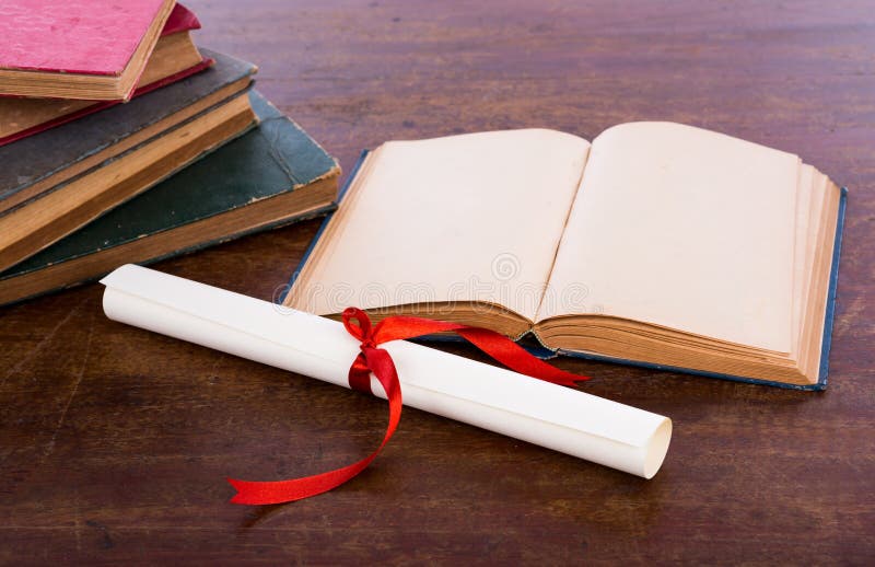 Diploma with old book stock image. Image of bachelor - 32186979