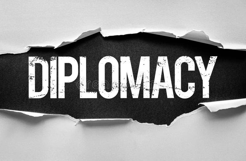 DIPLOMACY Emerges through Torn Paper in Bold, Distressed Letters ...