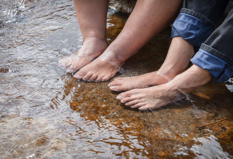 Dipping feet in water stock photo. Image of happiness - 47918914