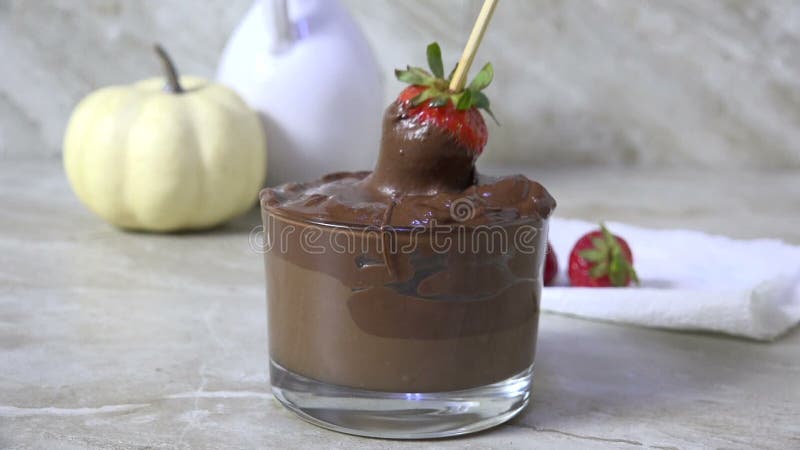 Dipping a Juicy Ripe Strawberry into Melted Chocolate Stock Video ...