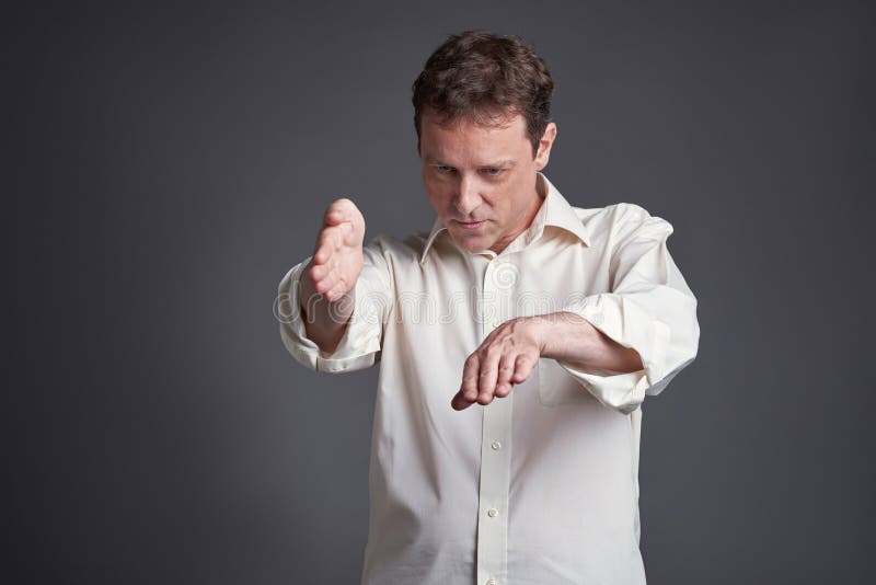 Directing man stock image. Image of hand, hands, shirt - 73993855