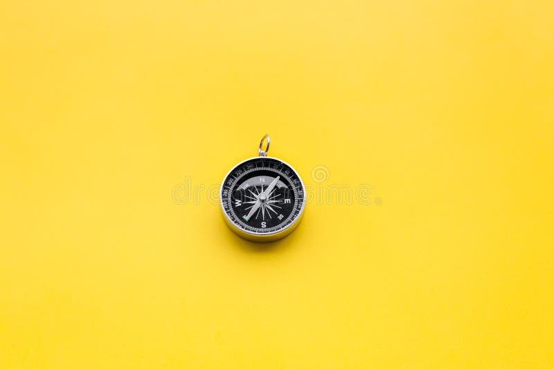 Direction Concept with Compass on Yellow Background Top View Mockup ...
