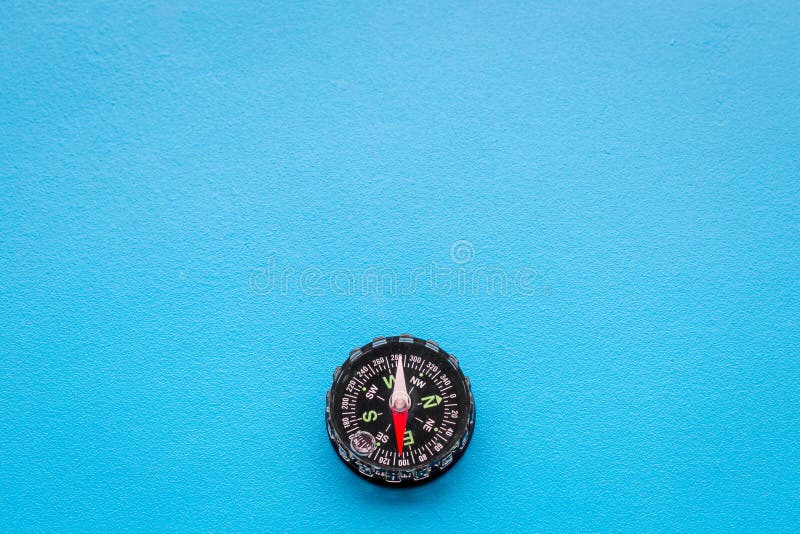 Direction of Movement. Compass on Blue Background Top View Copy Space ...