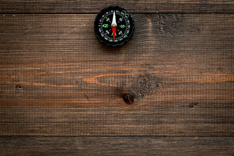 Direction of Movement. Compass on Wooden Background Top View Copy Space ...