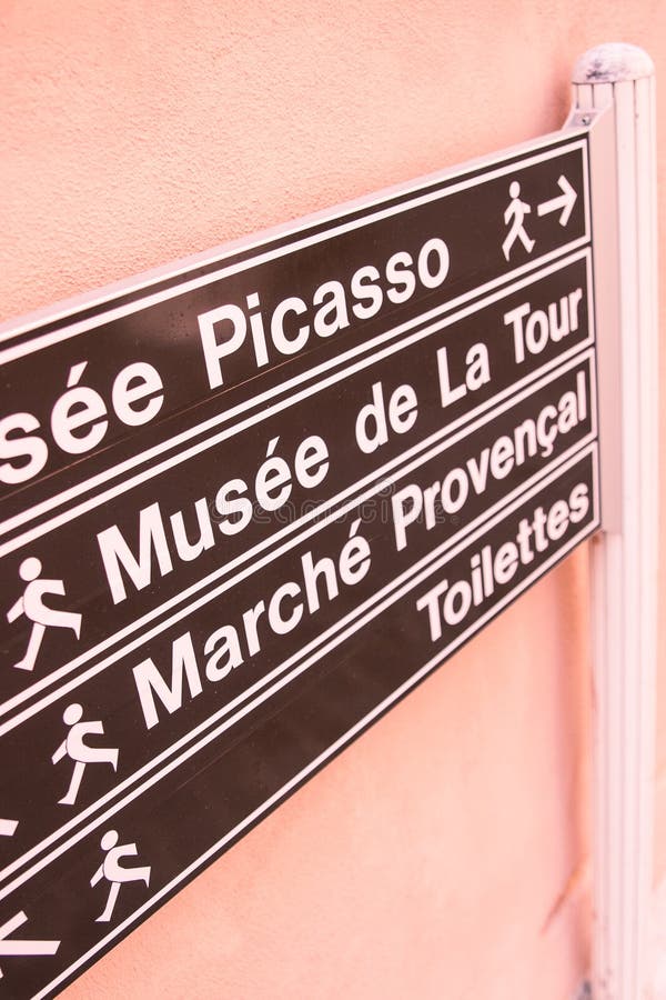 Direction Sign in Antibes, France Stock Image - Image of clouds, lamps ...