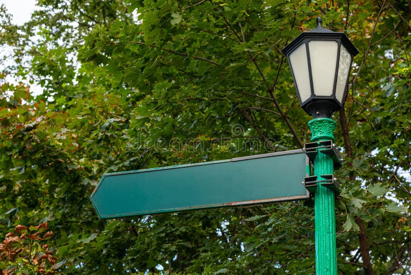 Direction Sign on Lightpost, Classic Style Stock Image - Image of empty ...