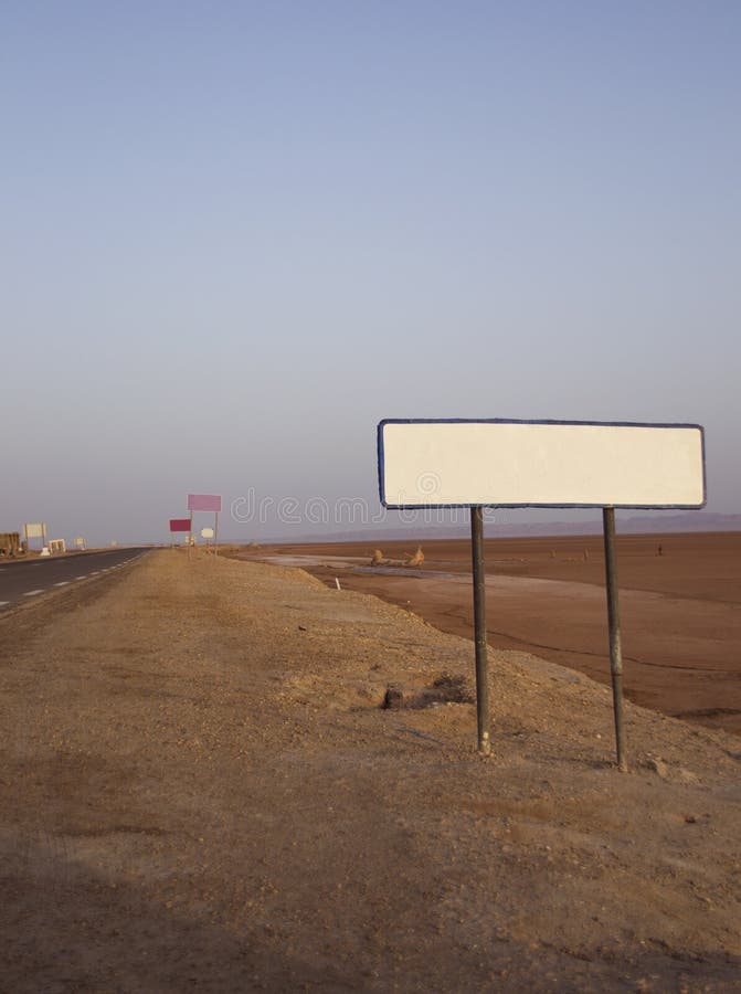 Direction Signal on an Empty Road Stock Photo - Image of objective ...