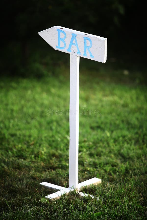 Directional Arrow Sign Pointing To The Bar Stock Photo - Image of ...
