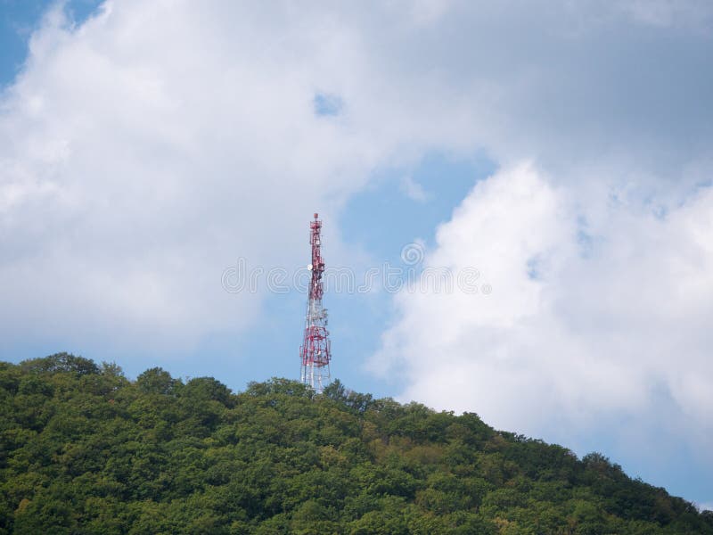 Directional Antenna Array on a Red and White Communication Tower ...