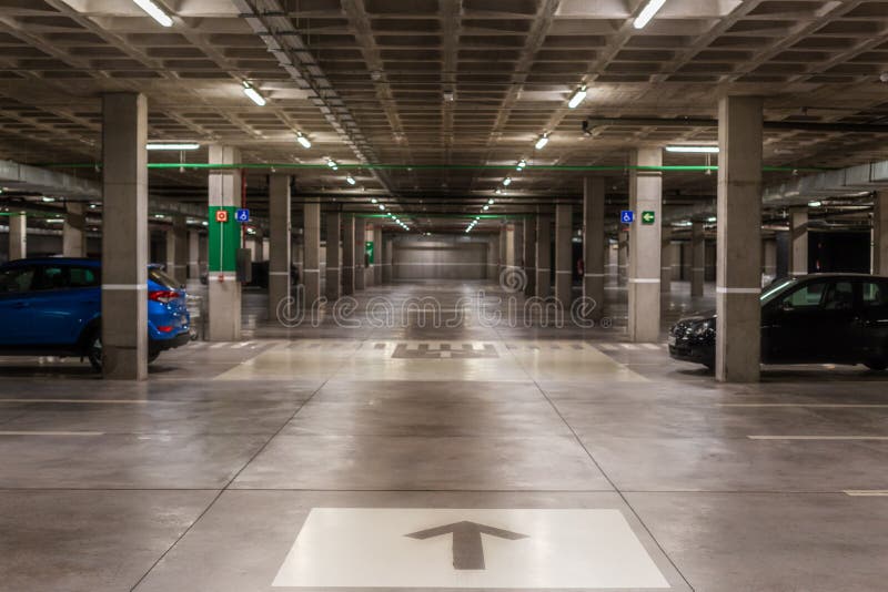 Directional Arrows in Underground Shopping Center Parking Stock Photo ...