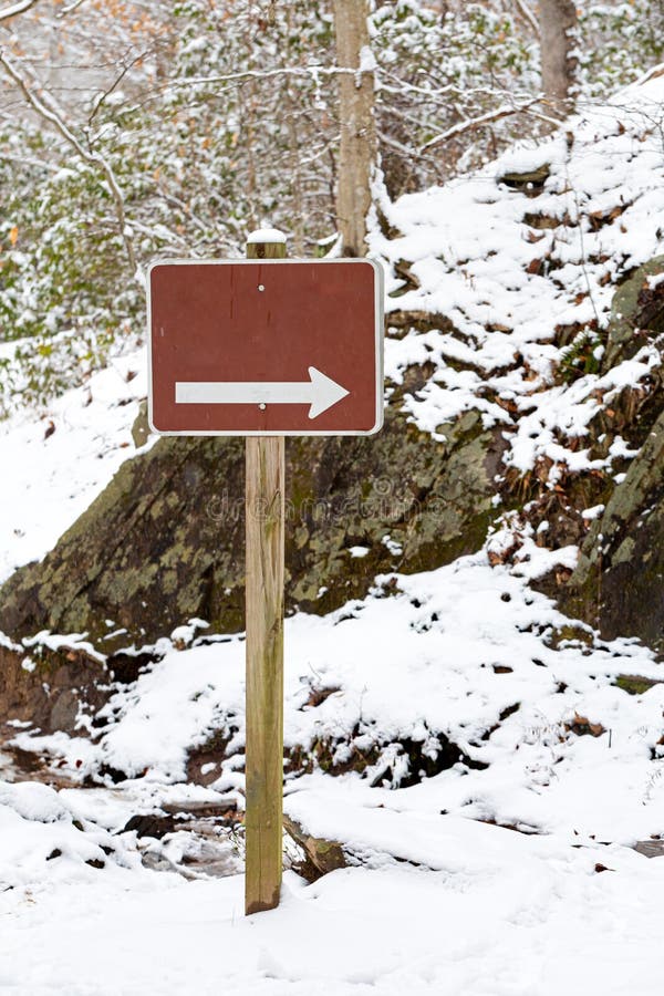 Directional Sign on a Hiking Trail Stock Image - Image of snow, rock ...