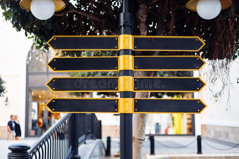 Directional Signpost with Multiple Blank Arrows in an Urban Setting ...