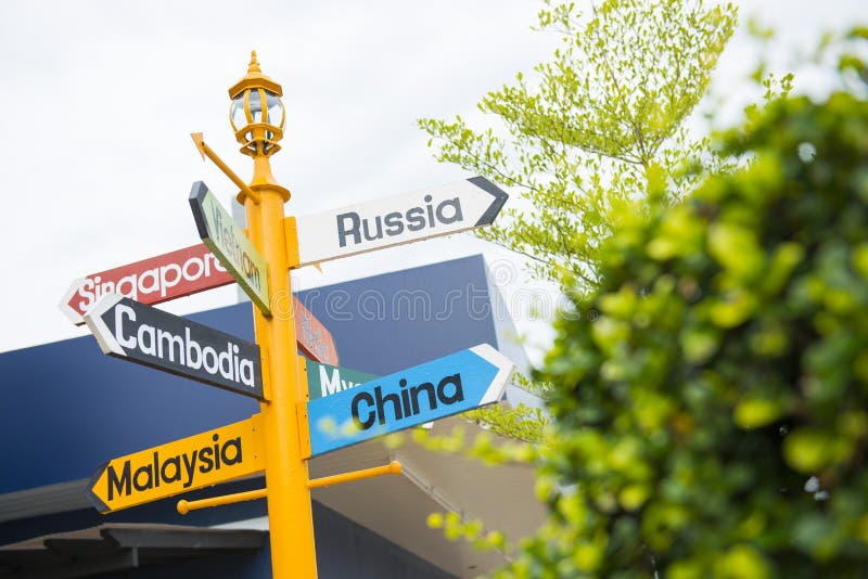 Directions Signpost To Many Different Countries Stock Photo - Image of ...
