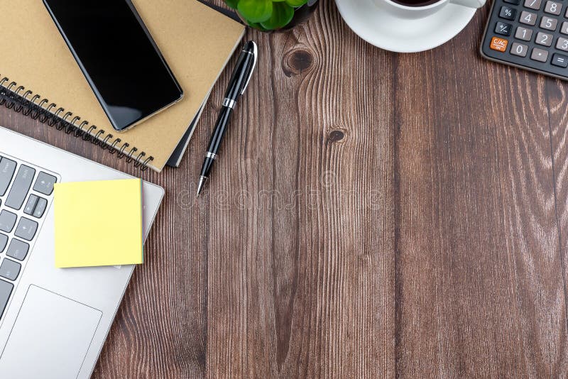 Directly Above View of Office Desk with Laptop, Coffee and Smart Phone ...