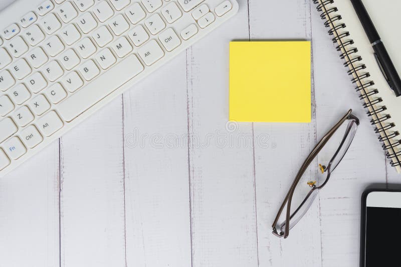 Directly Above View of Office Desk Table with Adhesive Note. Copy Space ...