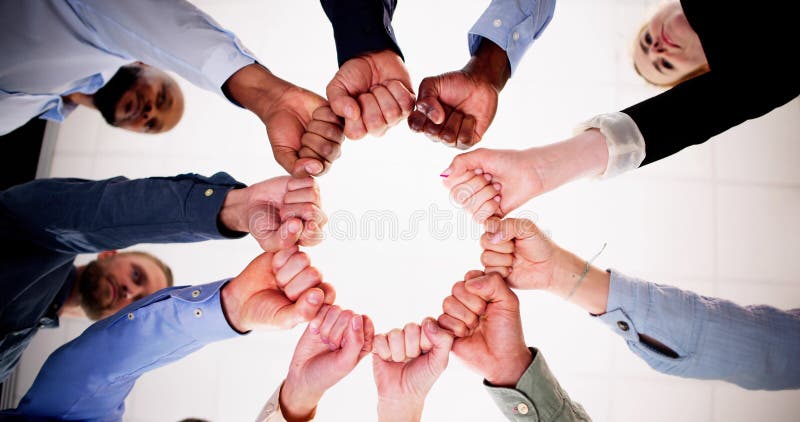 Directly Below Creative Business Team Stacking Hands Stock Photo ...