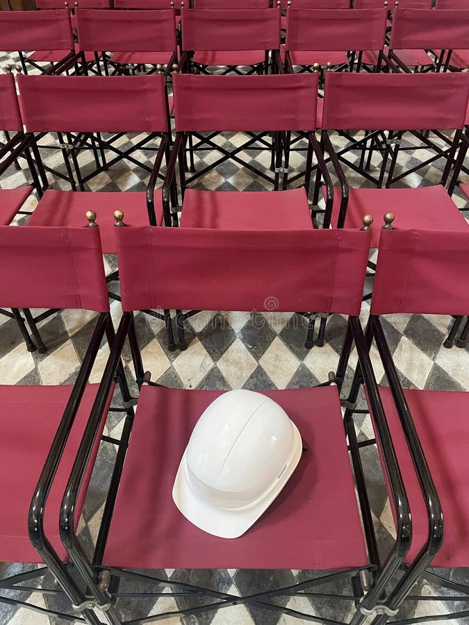 Director Model Folding Chairs with White Work Helmet Stock Photo ...